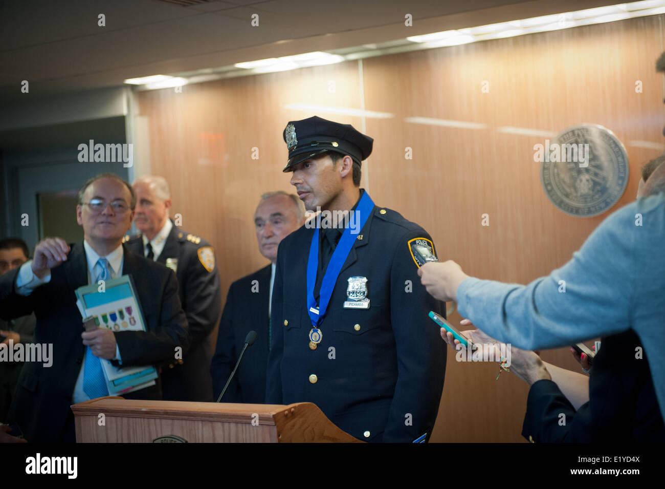 Manhattan, New York, USA. 10th June, 2014. Police Officer JUAN PICHARDO ...