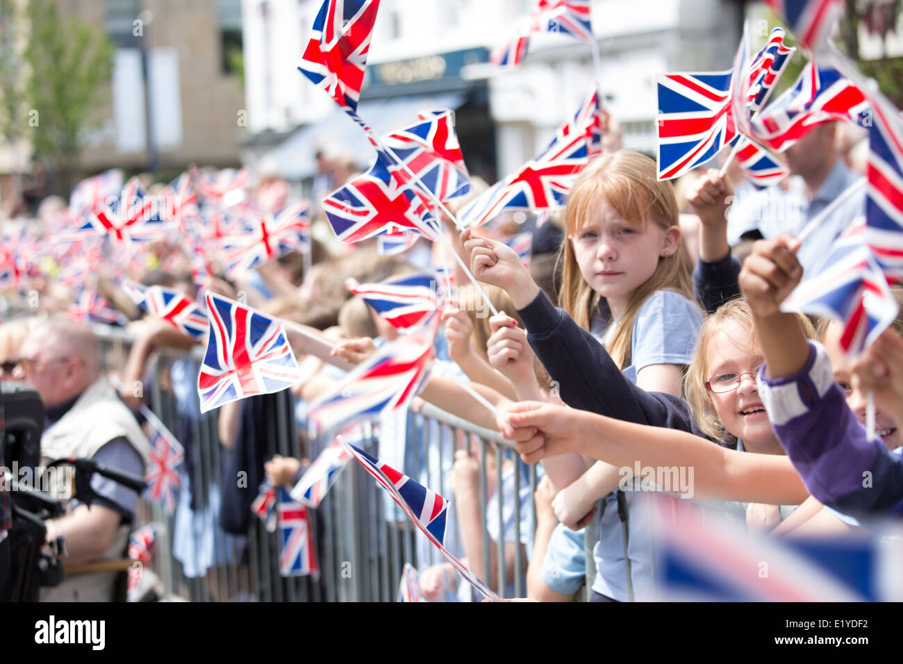 Flag waving children at a freedom parade in warwick england Stock Photo ...