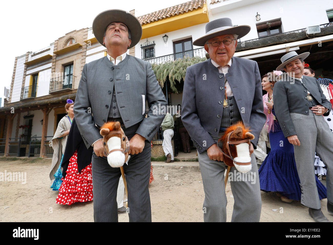 Rocio Romeria - man on hobby horse re-enacts bull fight with other men ...