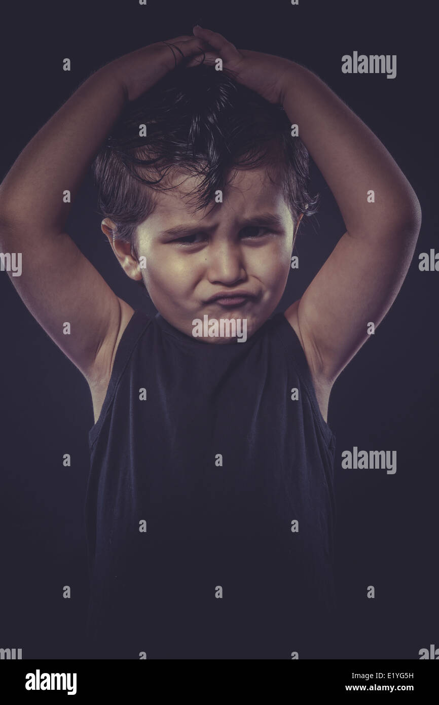 heavy boy with funny hair crest and appearance of rocker Stock Photo ...