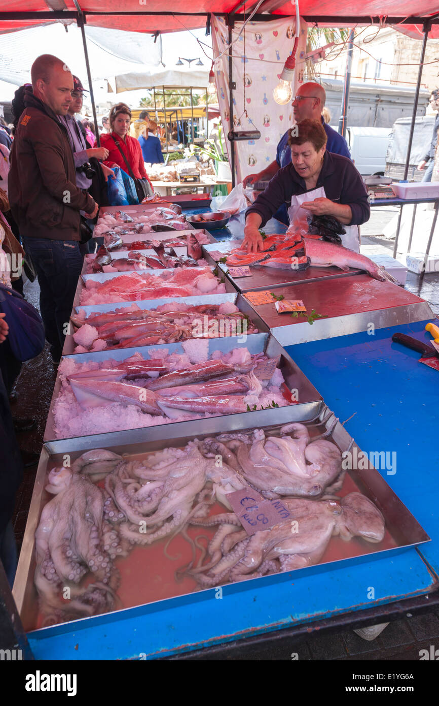 Fish stalls on the quay market, Marsaxlokk, Malta Stock Photo - Alamy