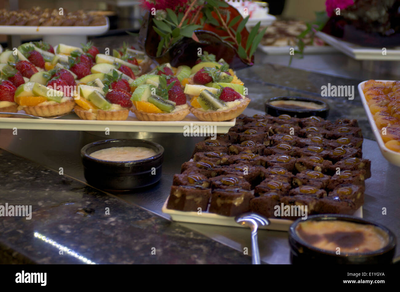 Turkish fruit desserts. baklava and rice puddings Stock Photo - Alamy