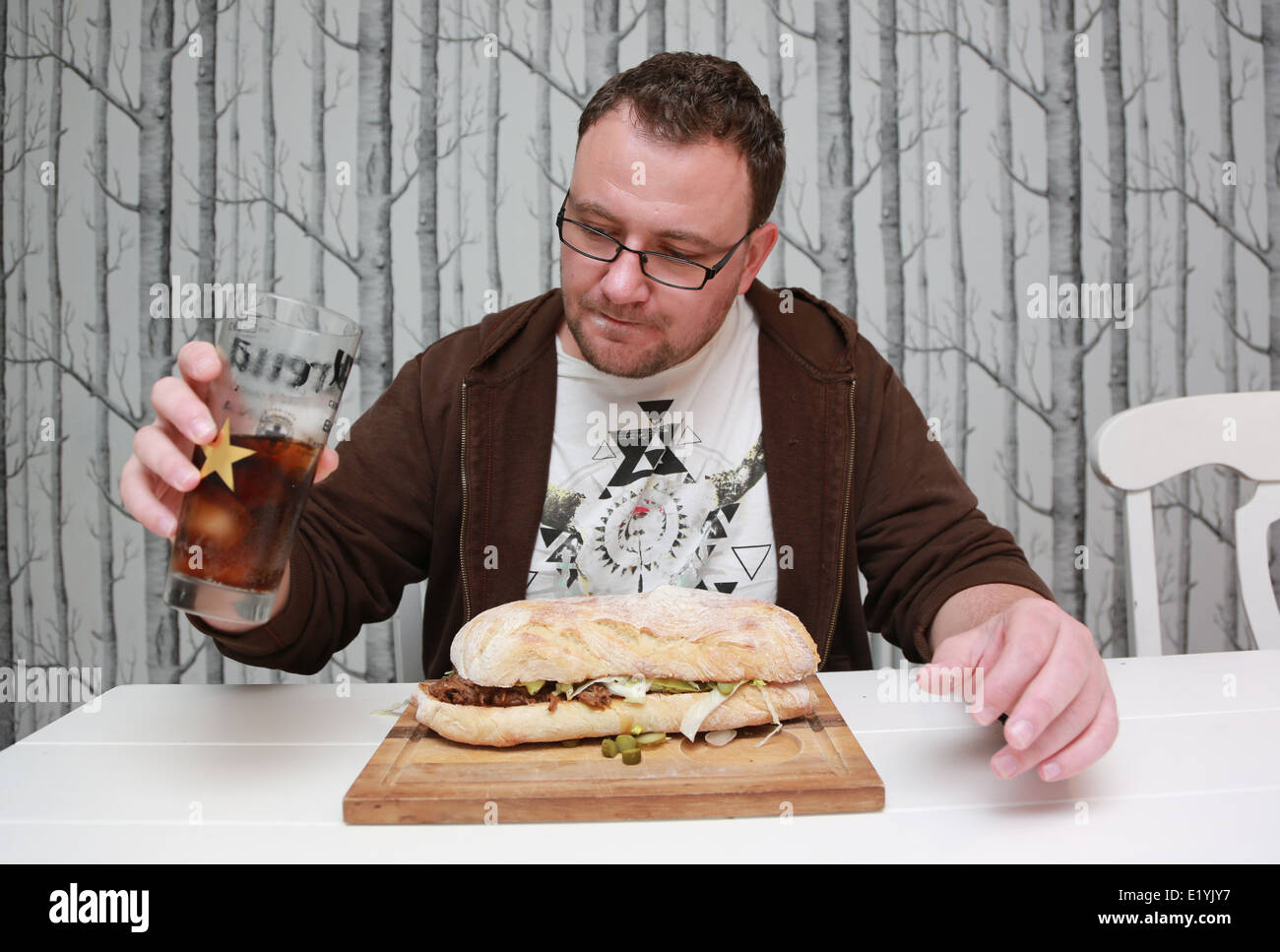 Man eating a huge Sandwich Stock Photo - Alamy