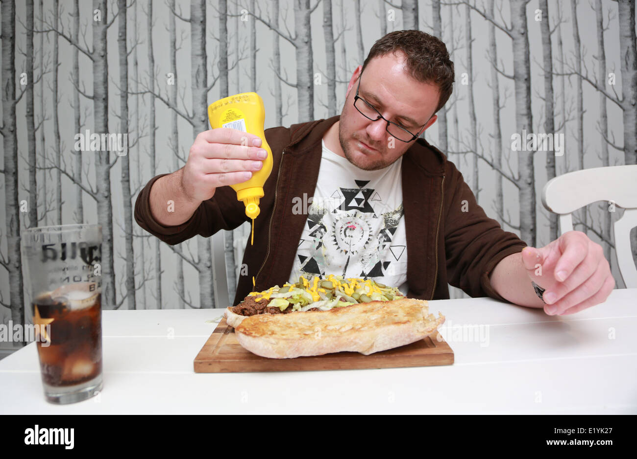 Man eating a huge Sandwich Stock Photo - Alamy