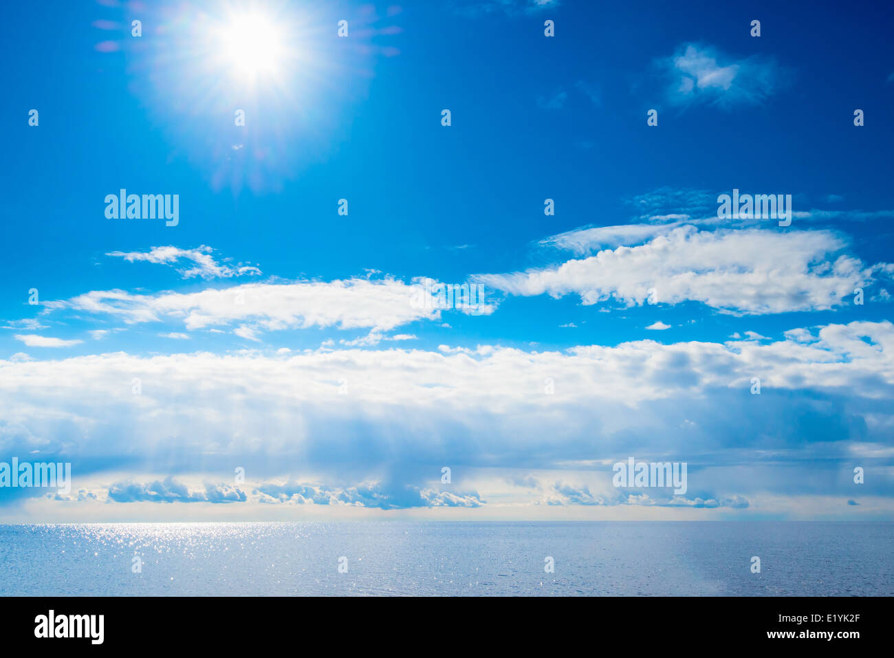 bright sun and blue sea Stock Photo - Alamy