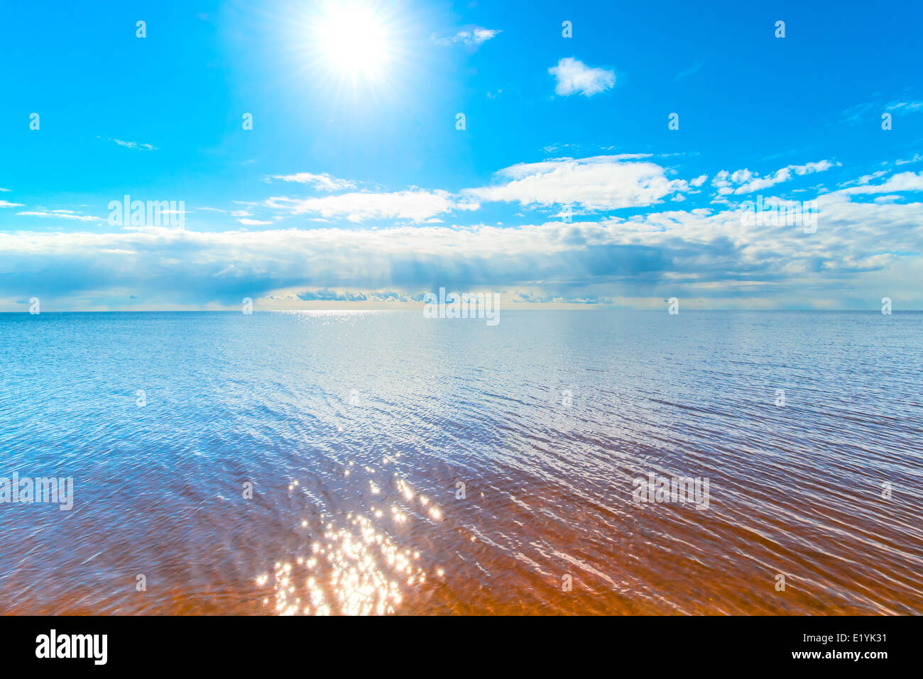 reflection of the sun on the surface of the water Stock Photo - Alamy