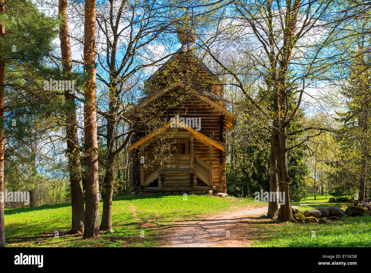 Beautiful wooden church in a forest Stock Photo - Alamy