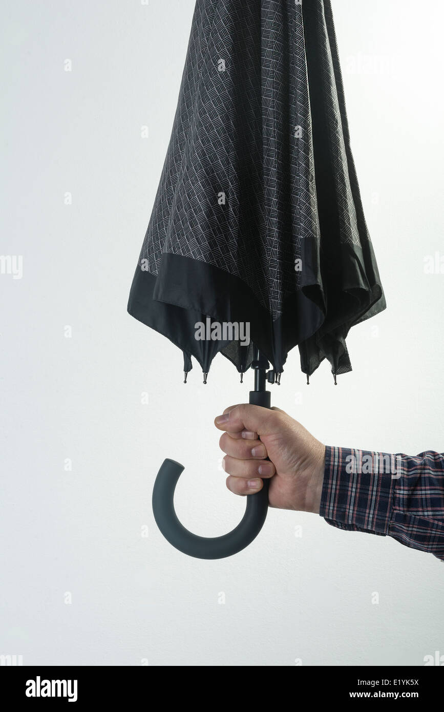 umbrella on hand Stock Photo - Alamy