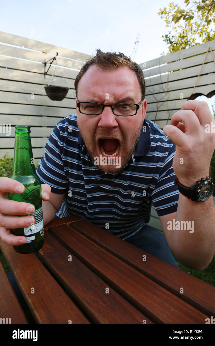 Frustrated man drinking beer hi-res stock photography and images - Alamy