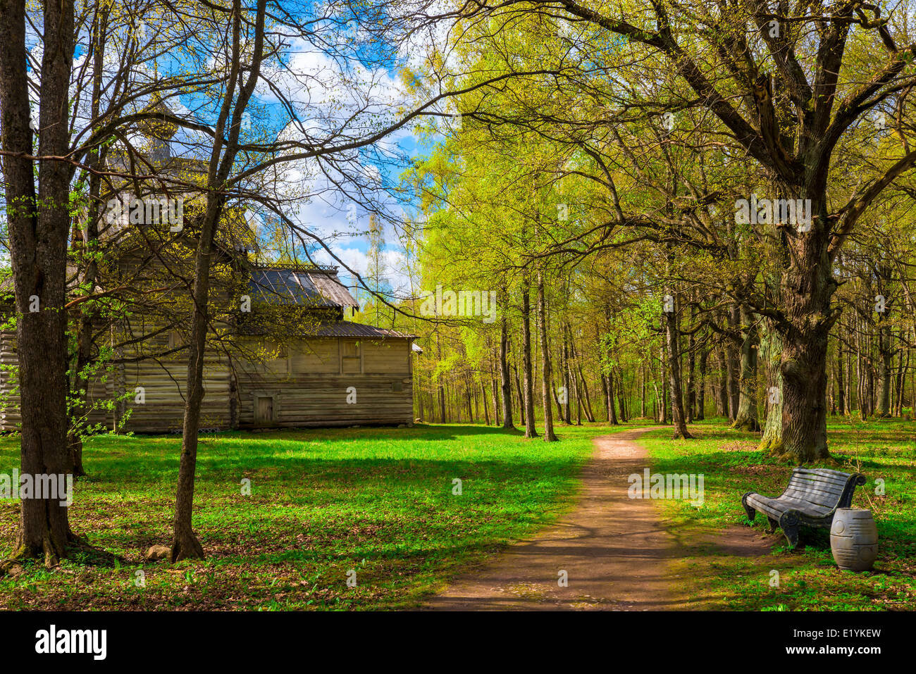 Orthodox wooden church in the spring park Stock Photo - Alamy