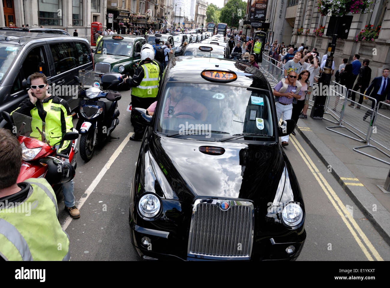 London, UK. 11th June 2014. An estimated 12,000 London taxi drivers ...