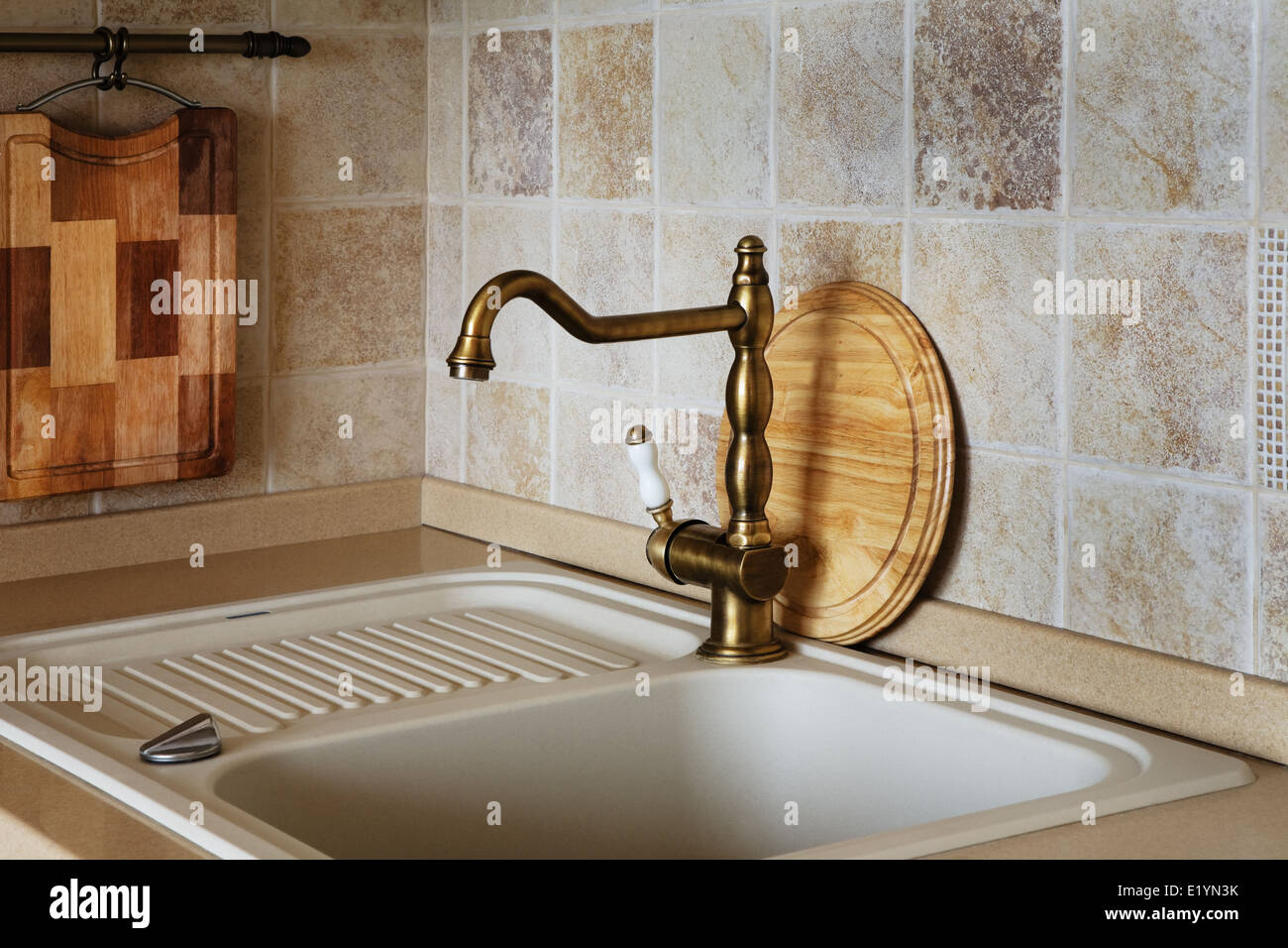 The beautiful water faucet of bronze color Stock Photo - Alamy