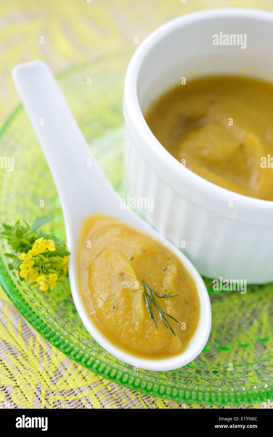 Vegetable puree in spoon hi-res stock photography and images - Alamy