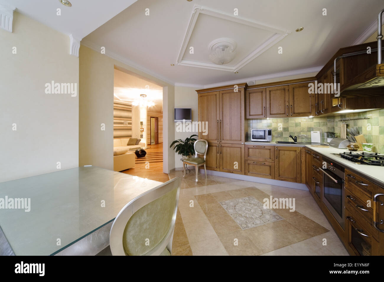 wooden greater kitchen in a modern apartment Stock Photo - Alamy