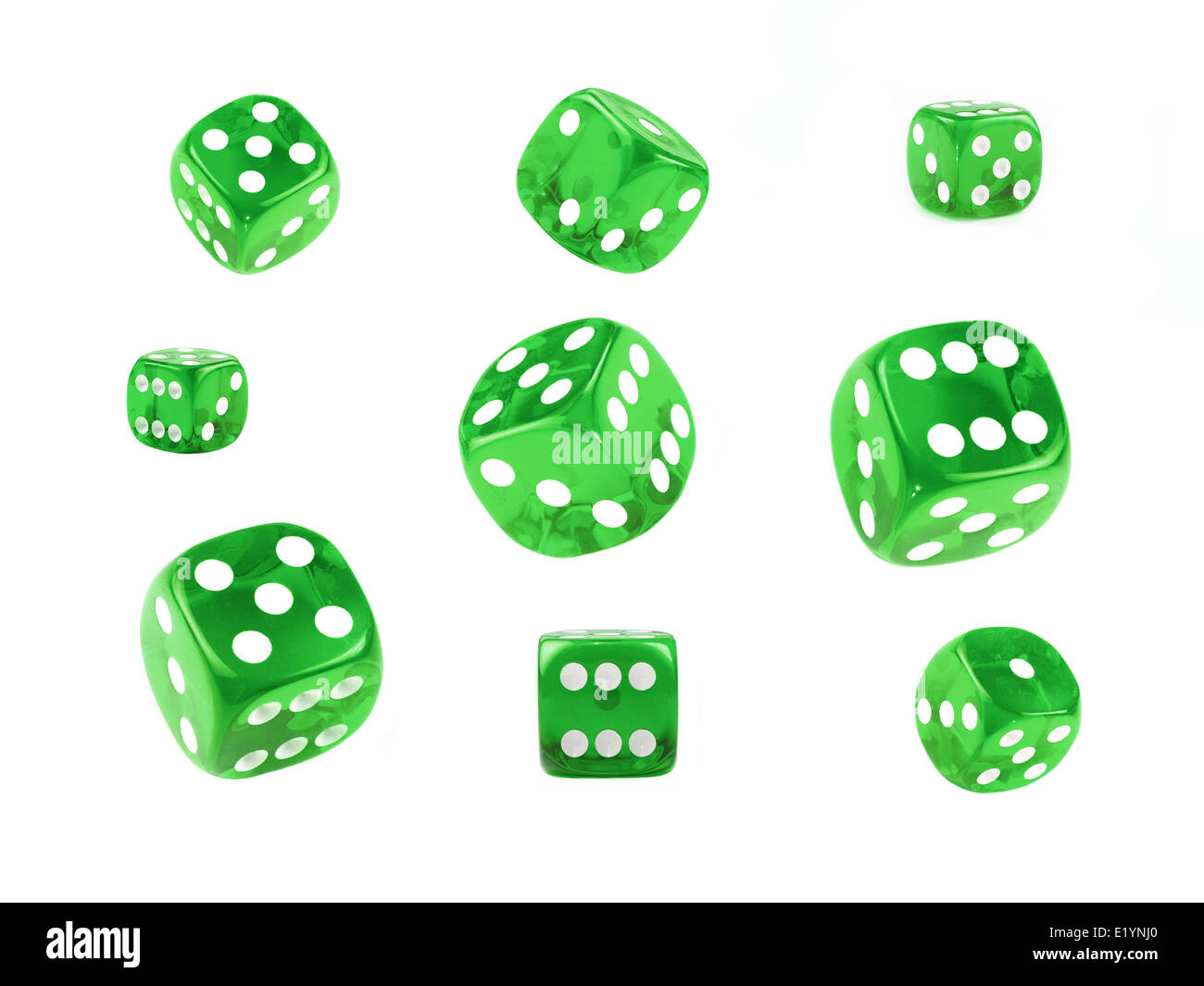 A collection of green dice at different angles isolated on a white ...