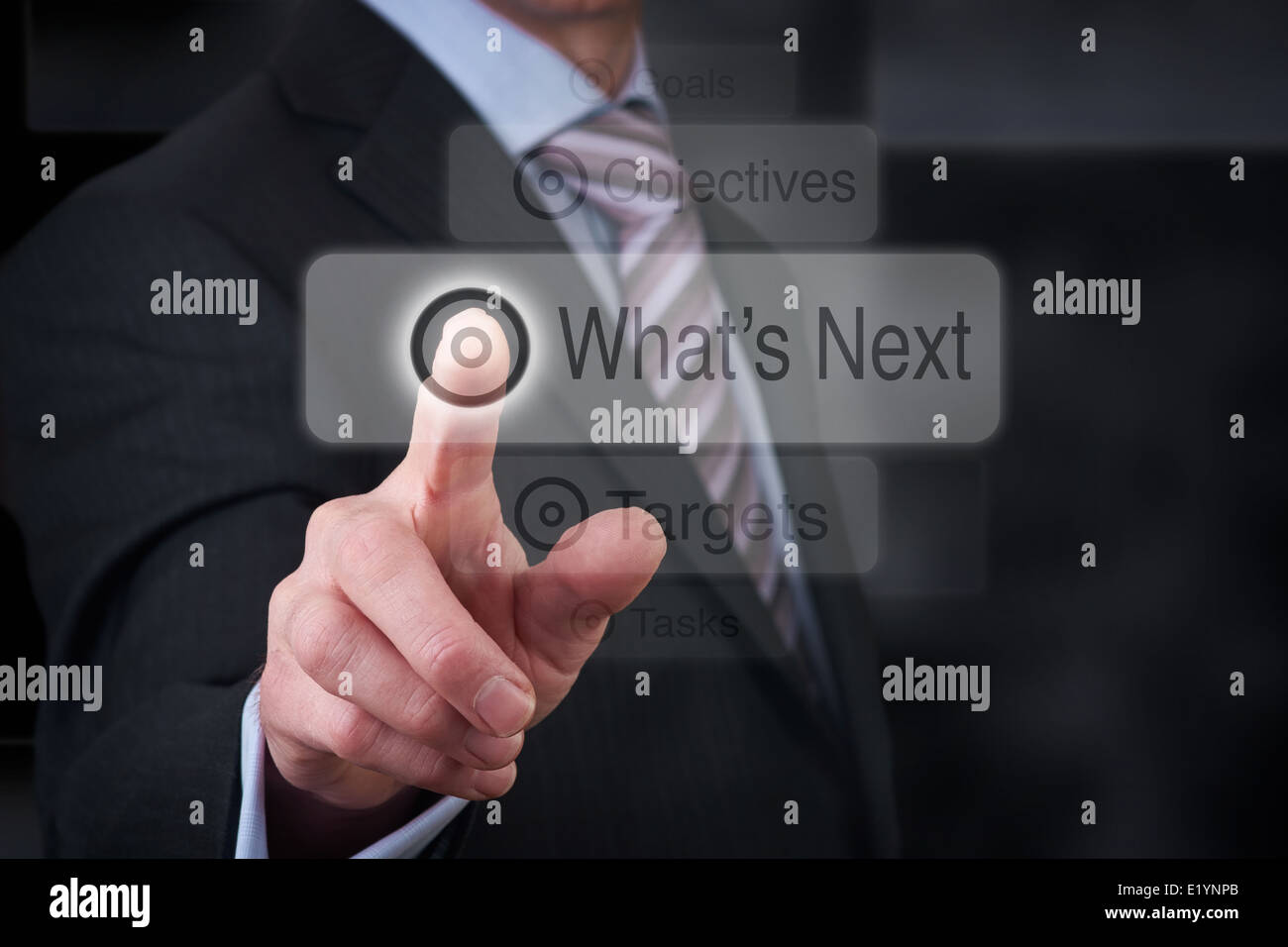 Business goals concept, mans hand pressing a "What's Next" Button Stock ...