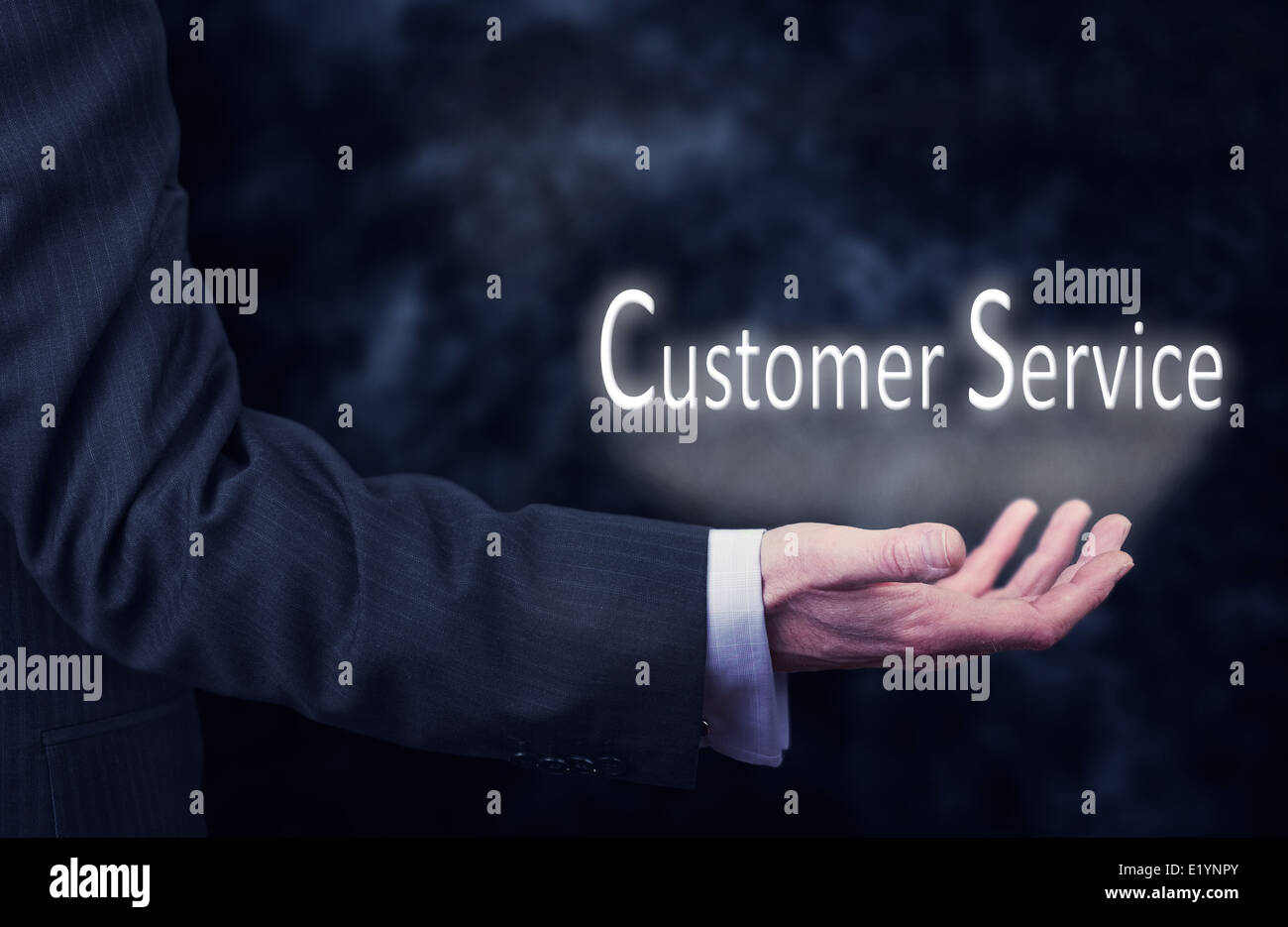 A Businessman's hand holding the words, Customer Service Stock Photo ...
