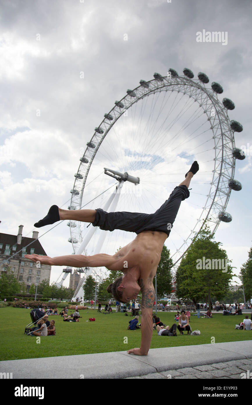 Acrobats practice their strength hand balancing act in Jubillee Gardens ...