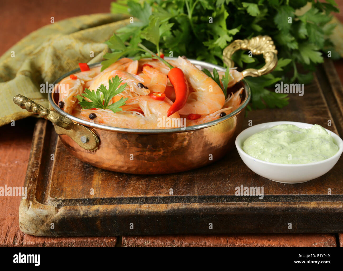 fried prawns with chilli in a copper pan, Indian style Stock Photo - Alamy