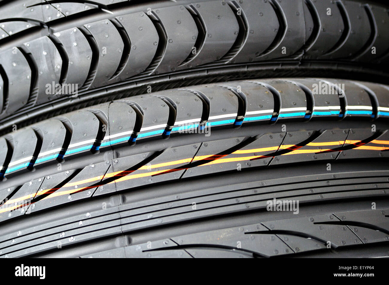 New car tire as a background ot texture Stock Photo - Alamy