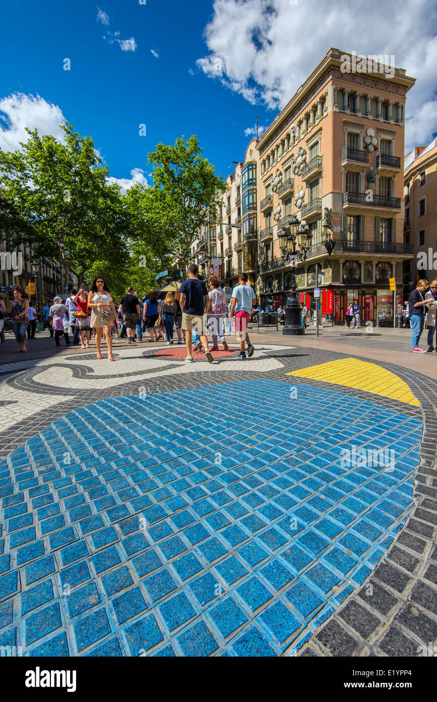 Colorful pavement mosaic by Joan Miro on la Rambla street, Barcelona ...