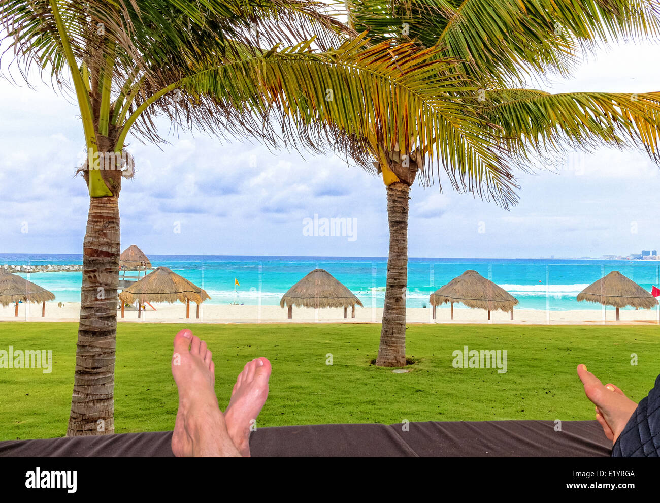 A couple relaxing at a remote beach Stock Photo - Alamy