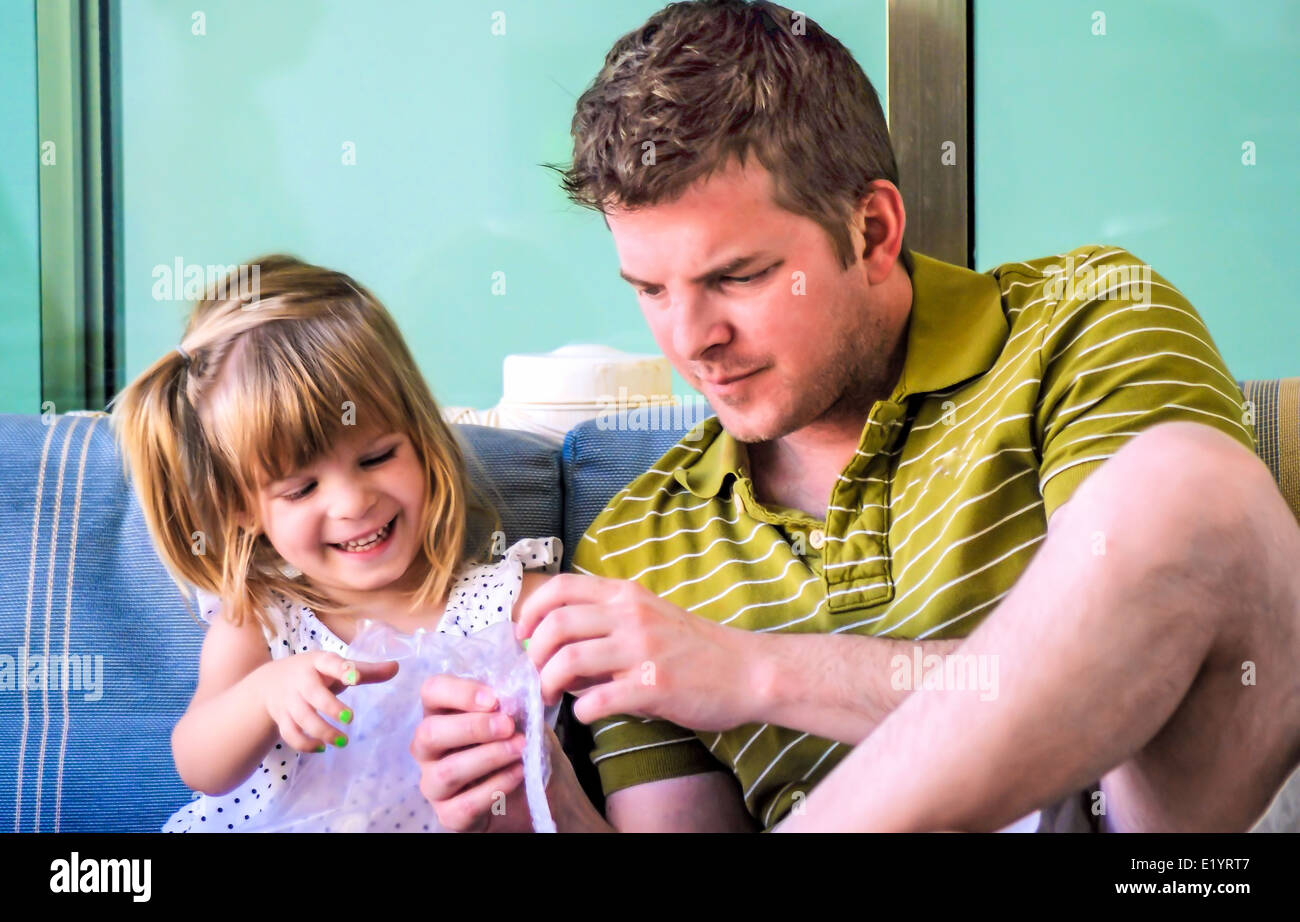 Dad and little child having fun at home Stock Photo - Alamy