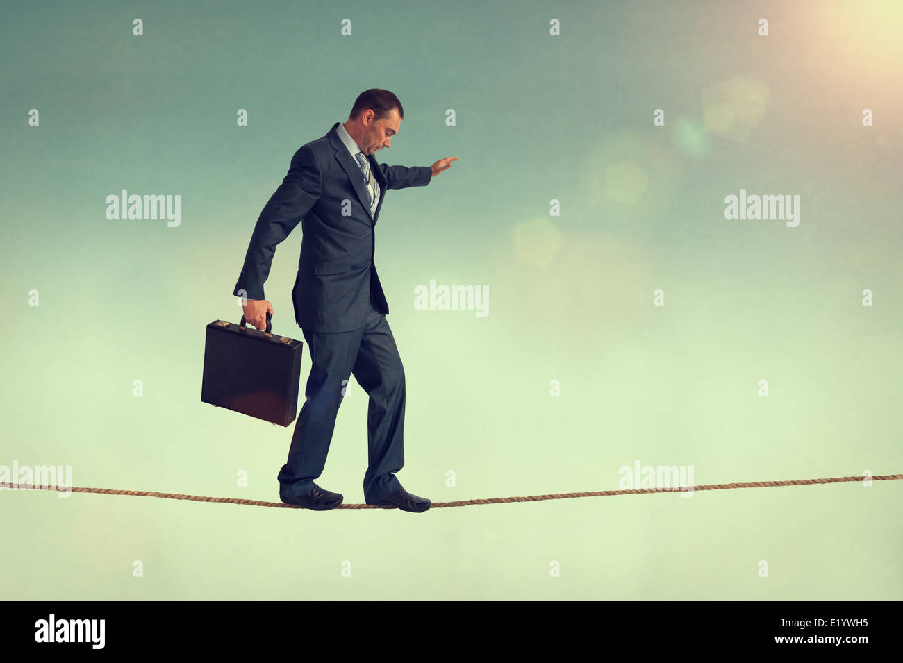 Balancing tightrope hi-res stock photography and images - Alamy