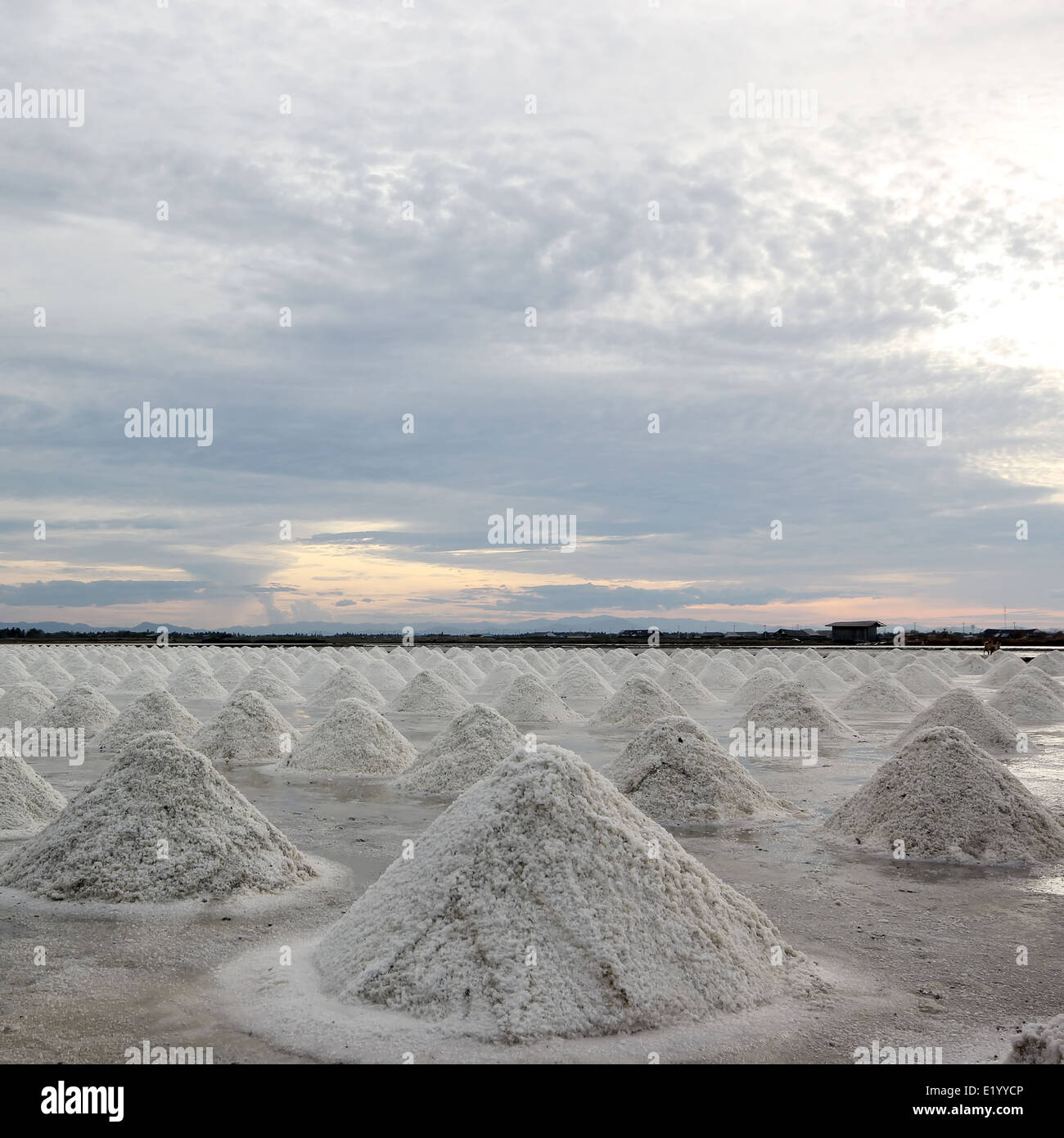 heap of sea salt with beautiful sky background Stock Photo - Alamy