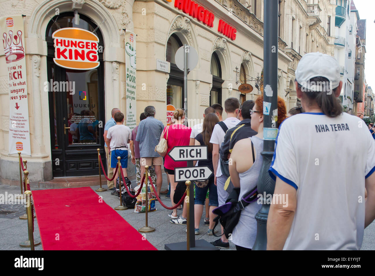 Budapest, Hungary. 11th June, 2014. People stand in queue for free ...