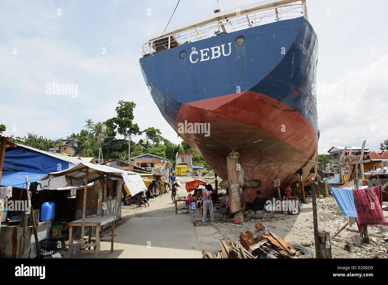 Tacloban City, Philippines. 11th June, 2014. A giant ship continues ...