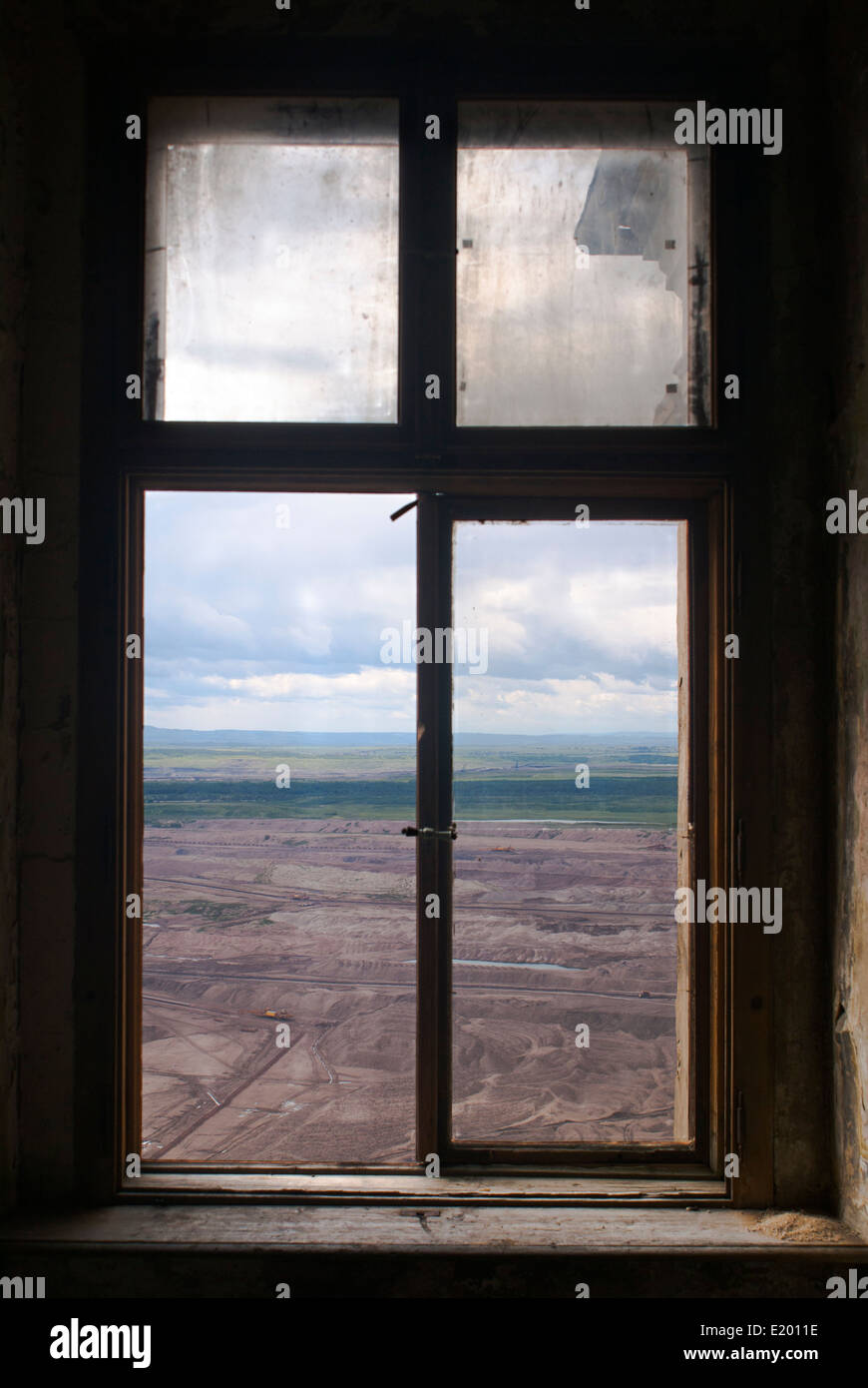 View through window on ecological heavy land coal mining destroying ...