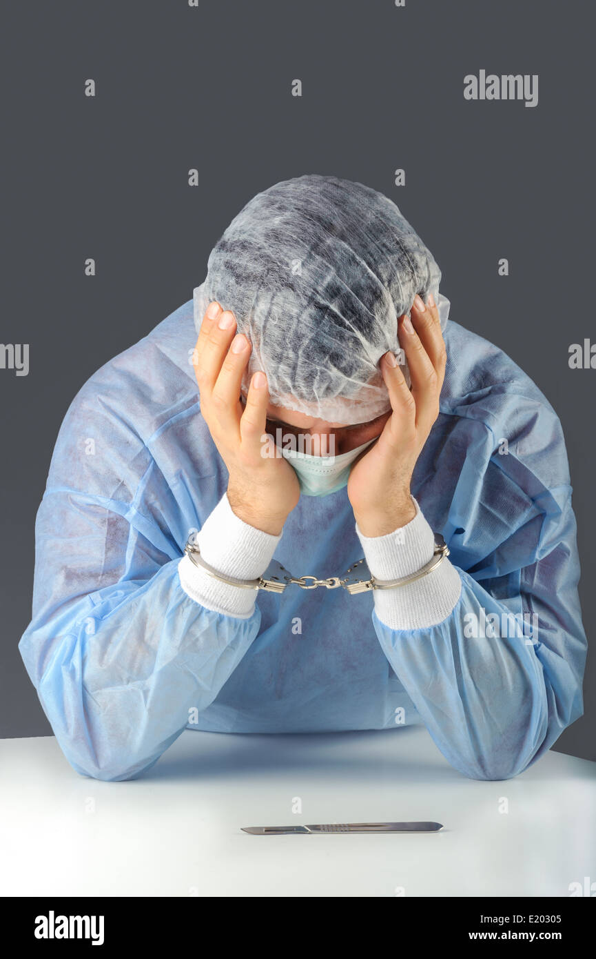 failure guilty doctor regretful criminal handcuffed surgeon portrait ...