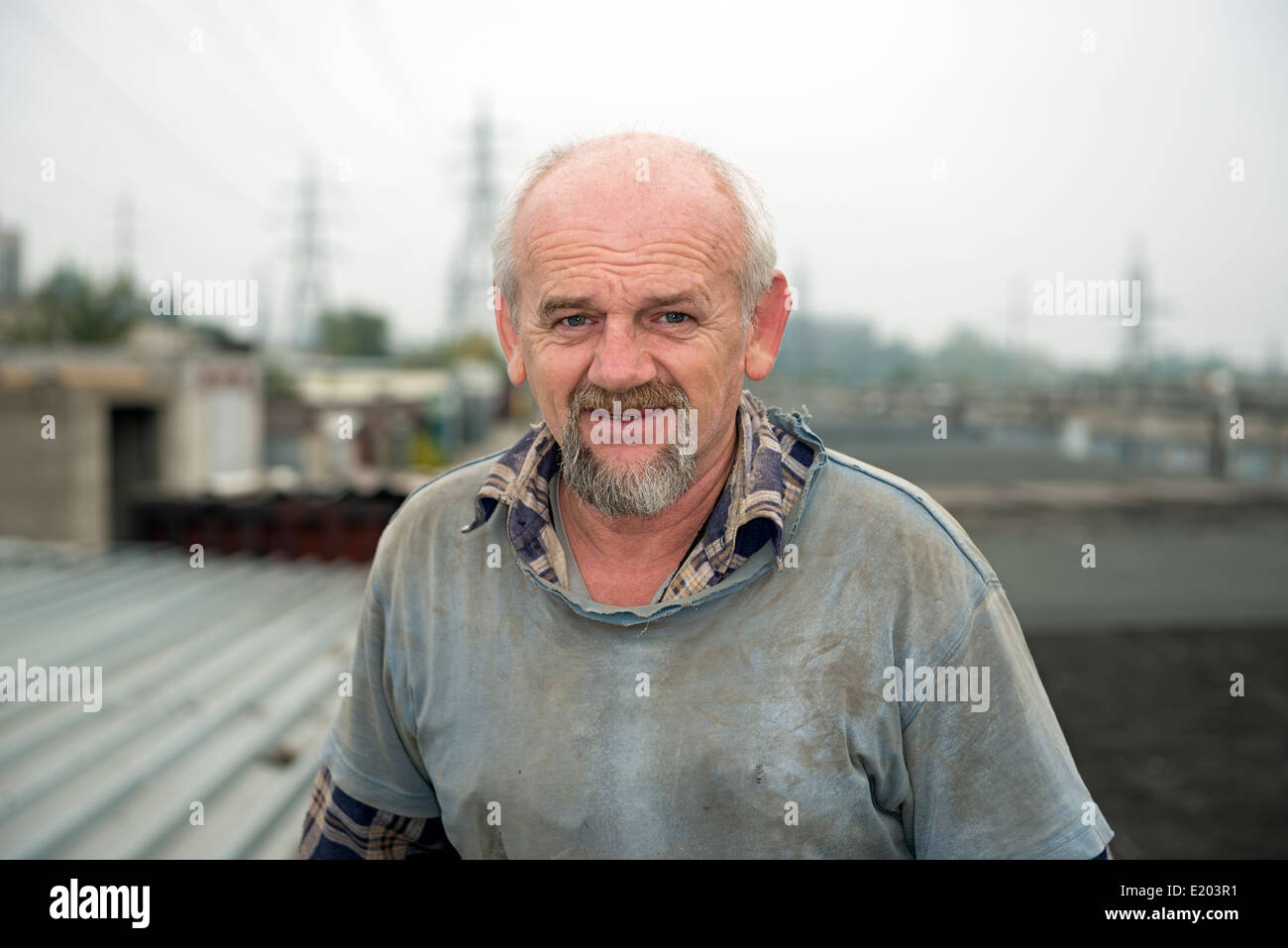 Old Man Walking With Raggedy Clothes