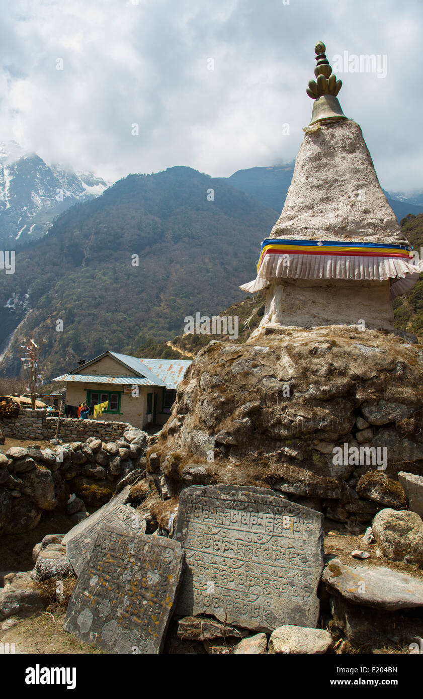 Nepal A Stupa standing over a Mani Wall in the village of Thamo with ...