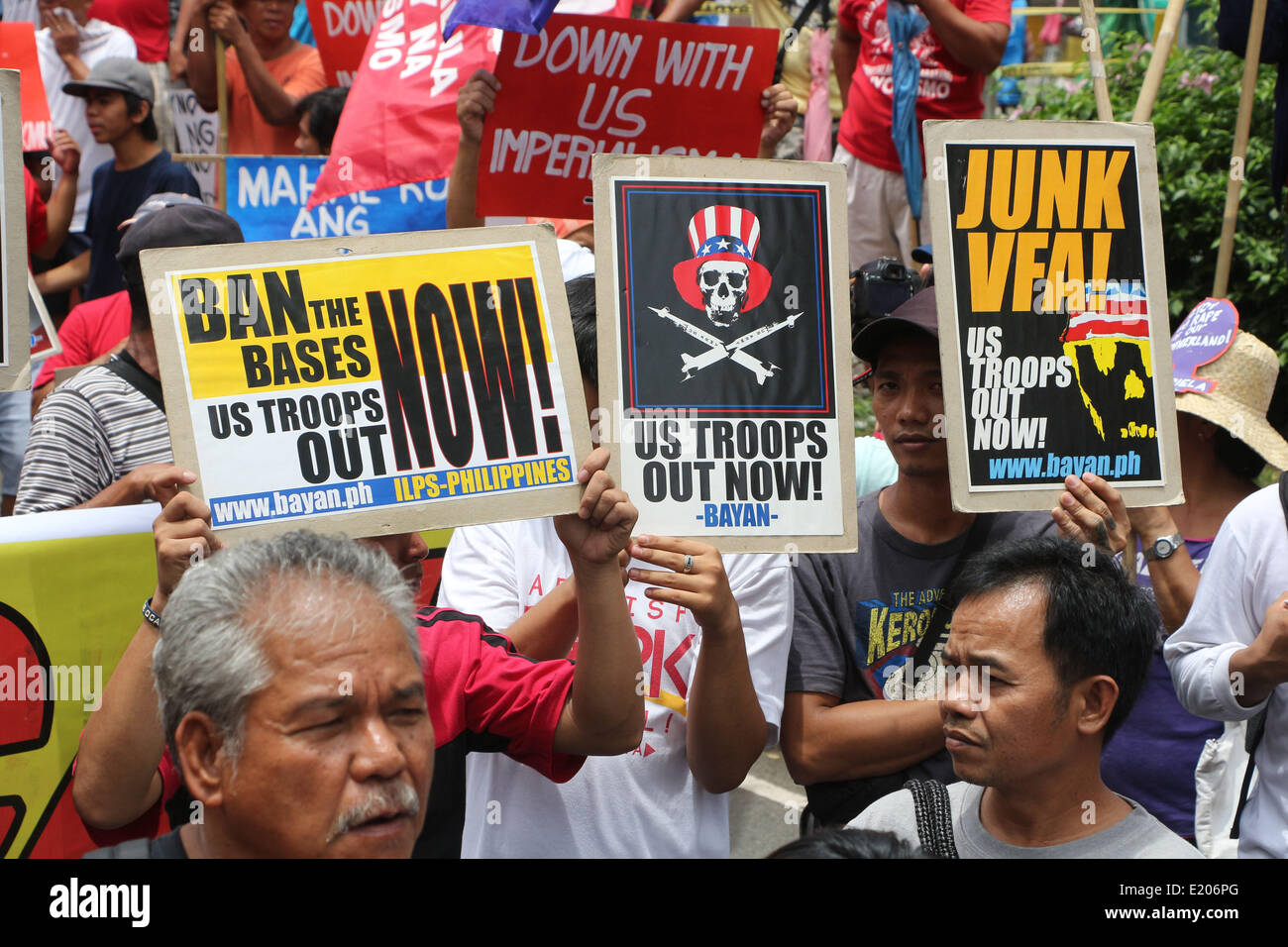 Various militant groups with their placards protesting the presence of ...