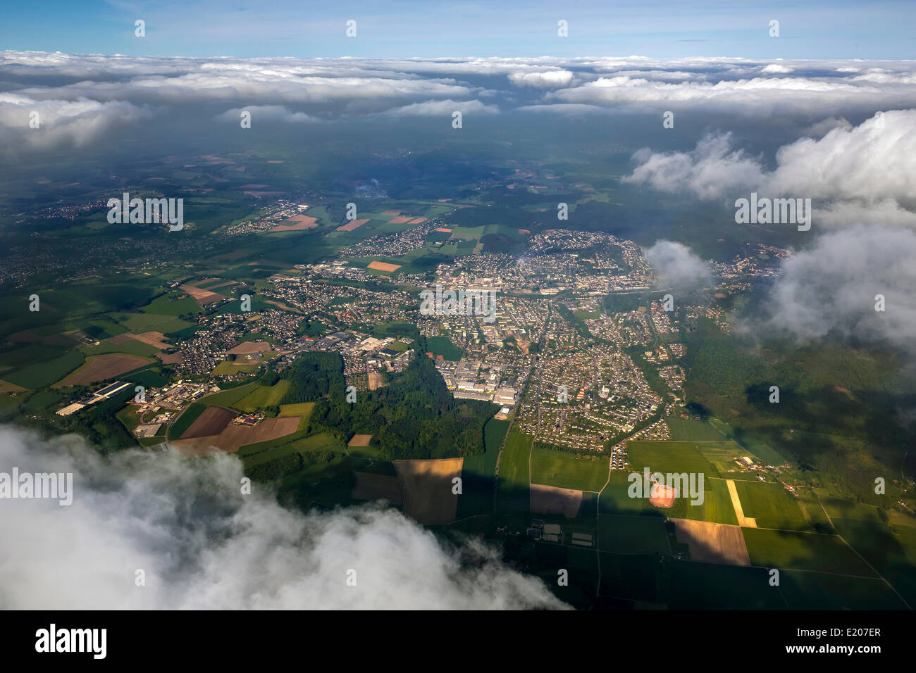 Aerial view, townscape through the clouds, Menden, Sauerland, North ...
