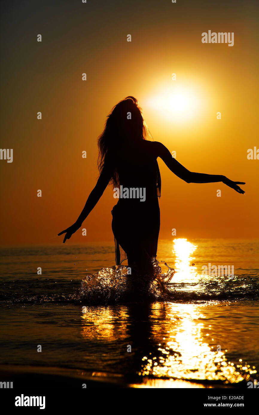 Silhouette at sunset Stock Photo - Alamy