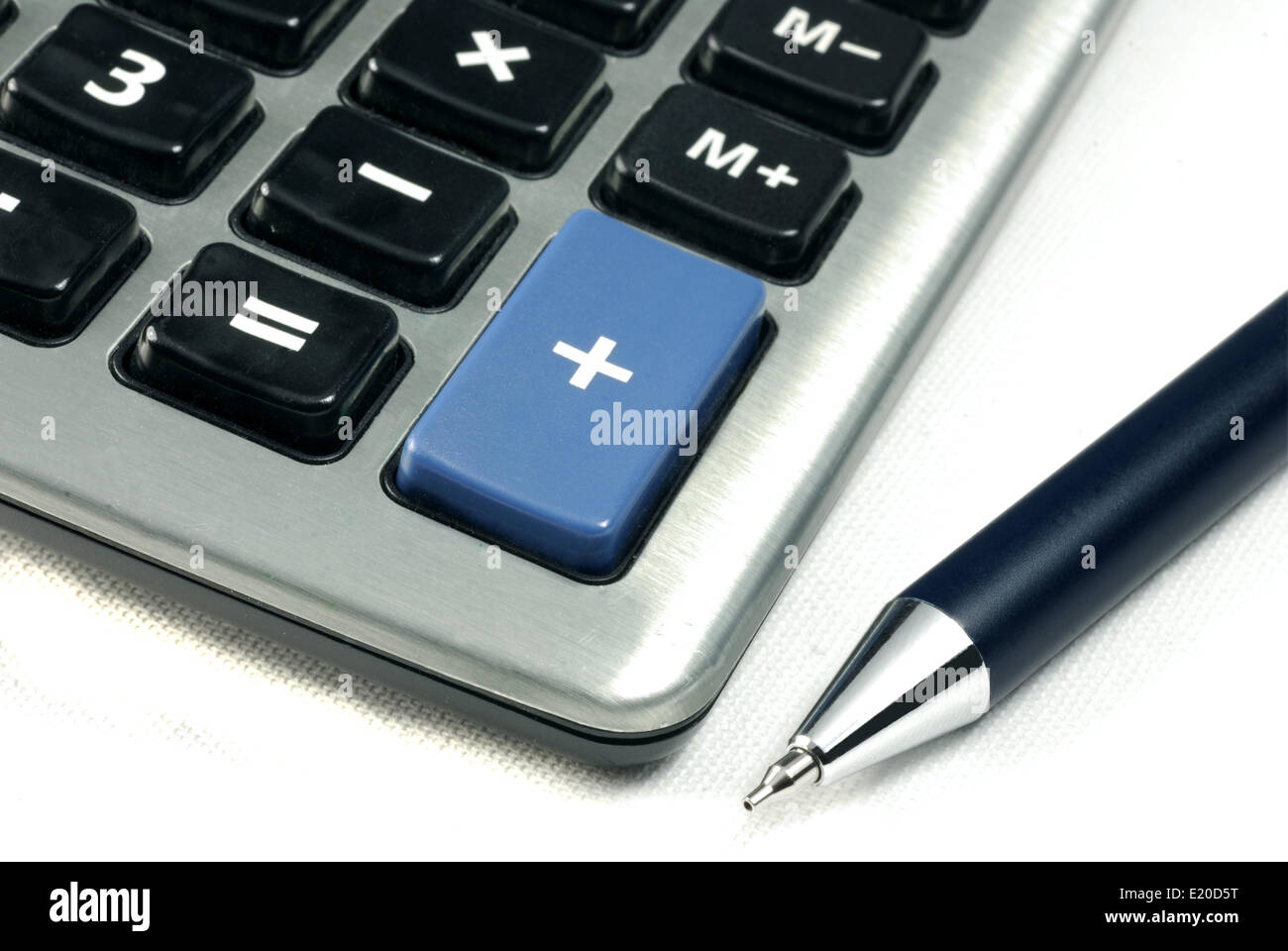 Calculator and Pen Stock Photo - Alamy