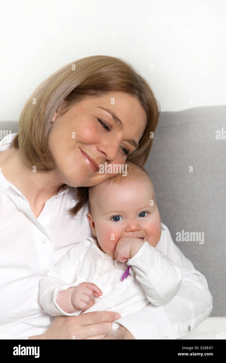 Happy mother and baby at home Stock Photo - Alamy