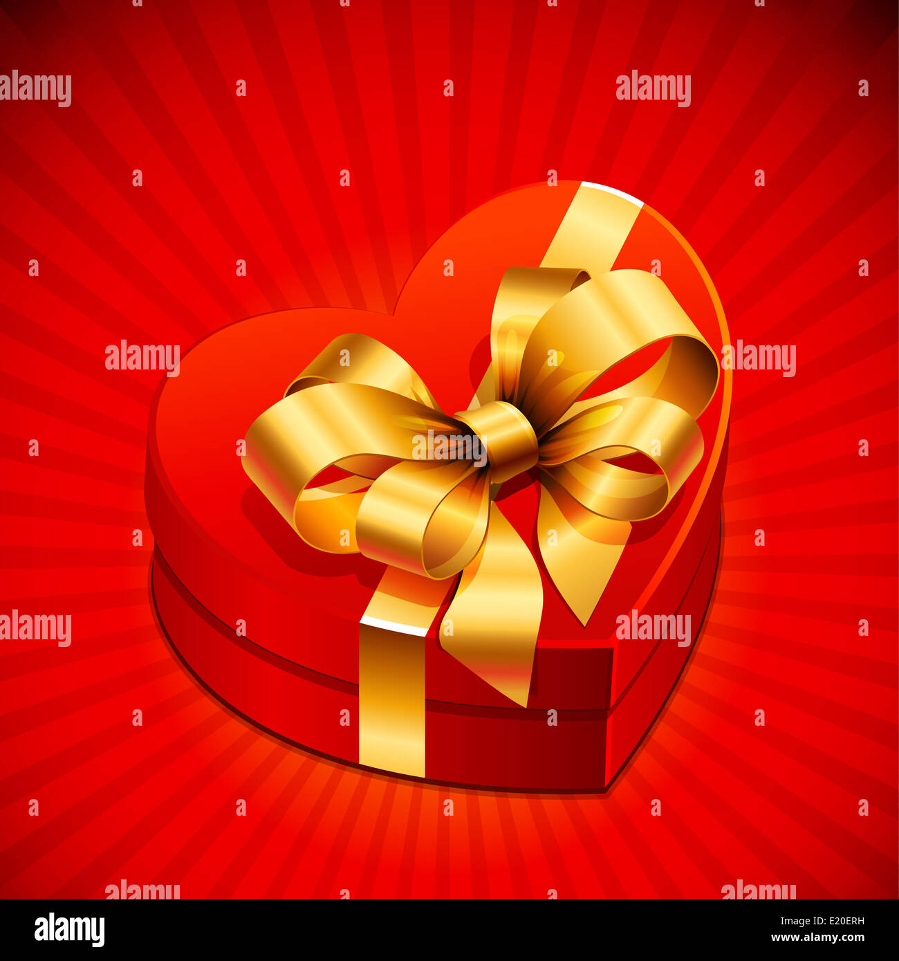 heart shape gift with golden bow Stock Photo - Alamy