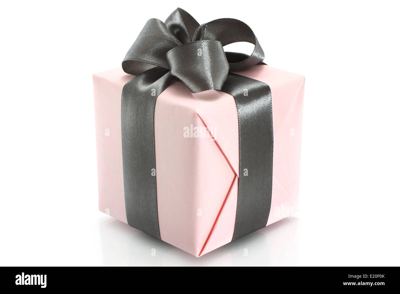 Present box with grey bow on a white background Stock Photo - Alamy