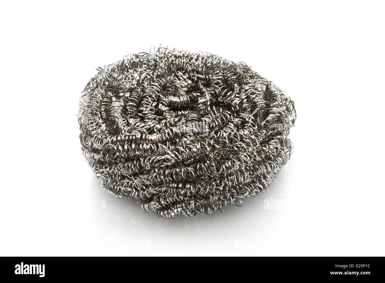 Wire wool scourer on a white background Stock Photo - Alamy
