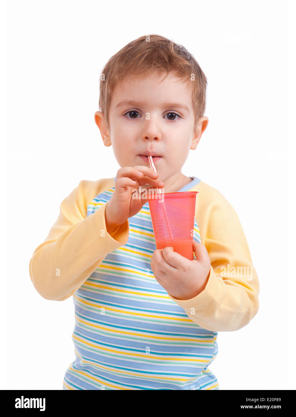 Boy drinking juice Stock Photo - Alamy