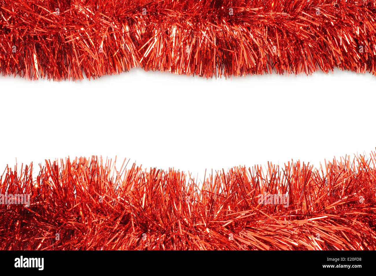 Red tinsel frame close-up on white background Stock Photo - Alamy