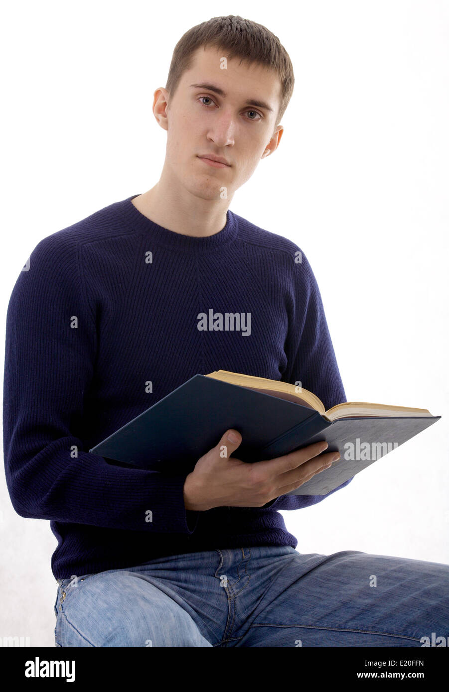 Man with books Stock Photo - Alamy