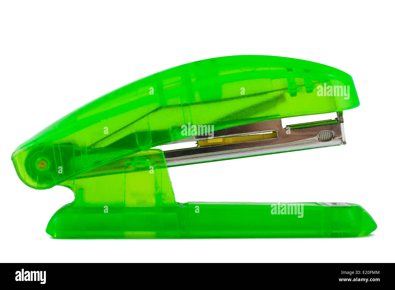 Green transparent stapler Stock Photo - Alamy