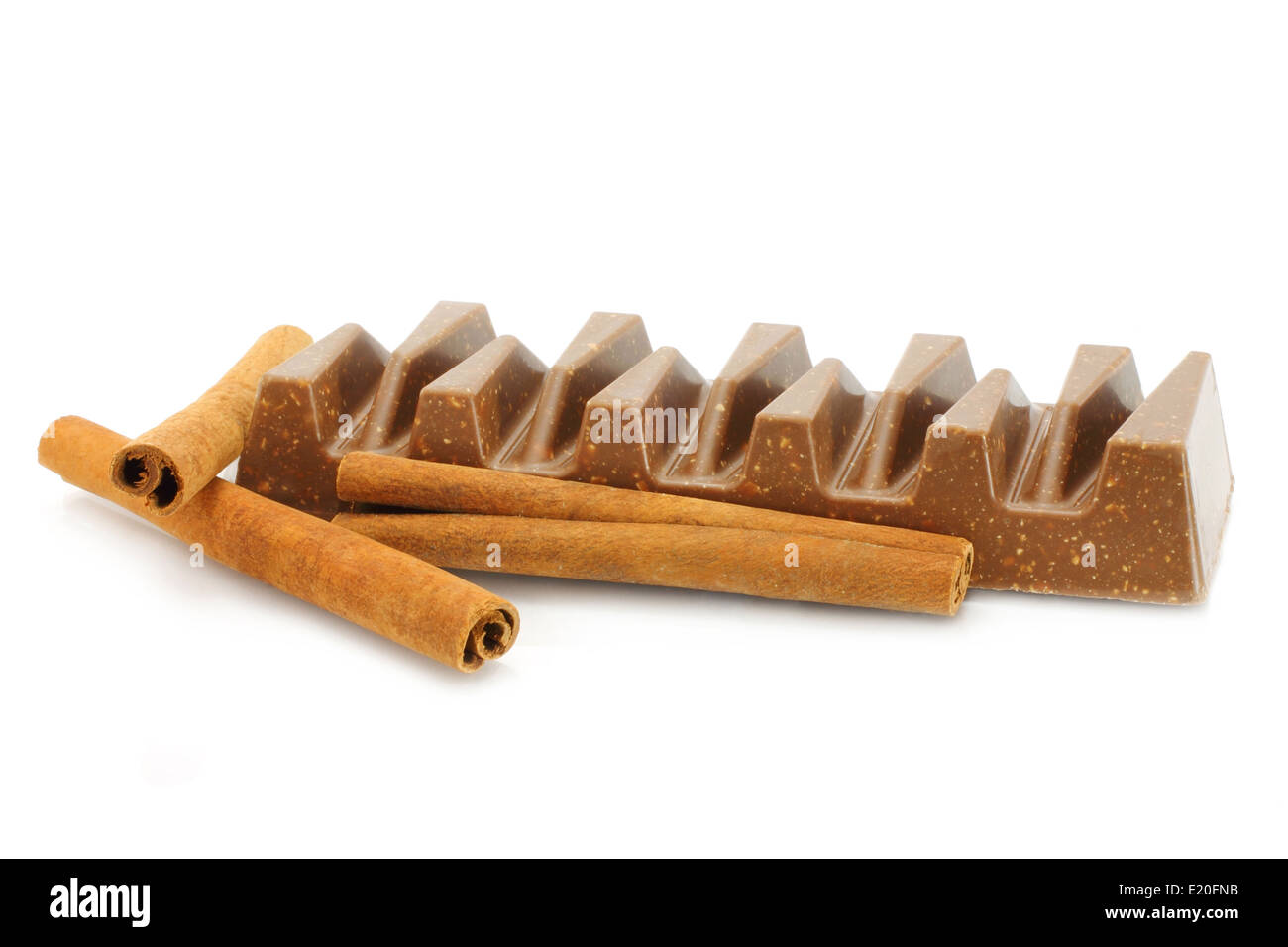 Chocolate and cinnamon sticks on white background Stock Photo - Alamy