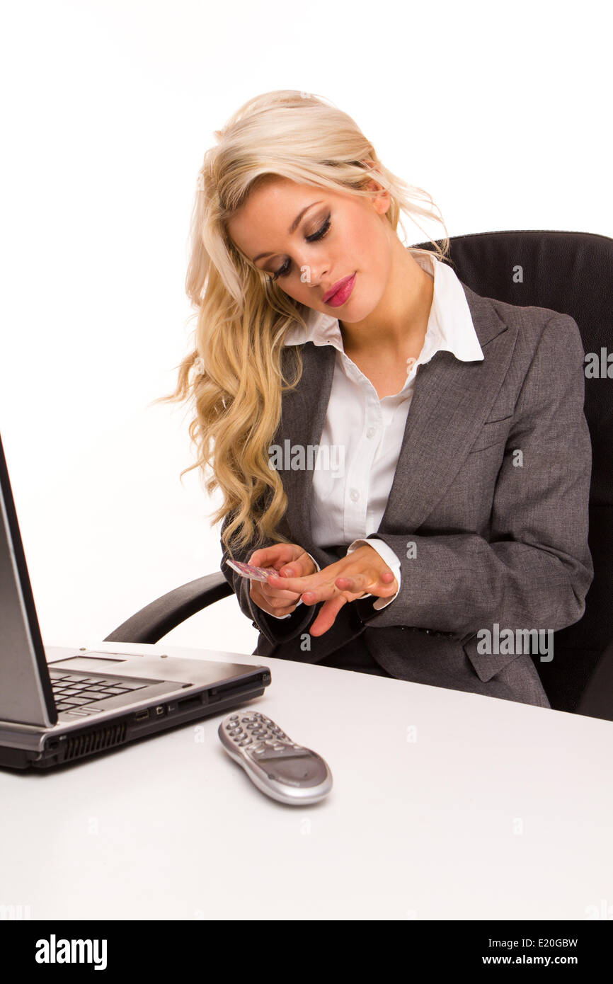 Bored businesswoman in front of computer Stock Photo - Alamy