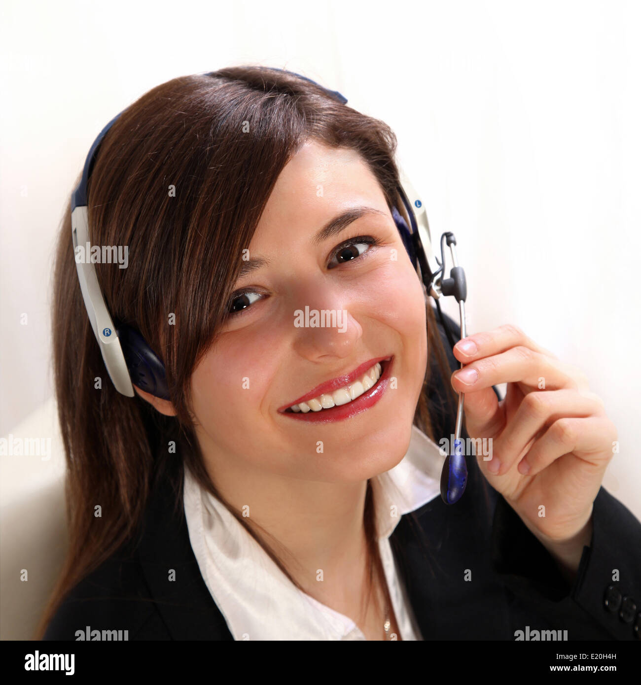 cheerful, friendly receptionist Stock Photo - Alamy